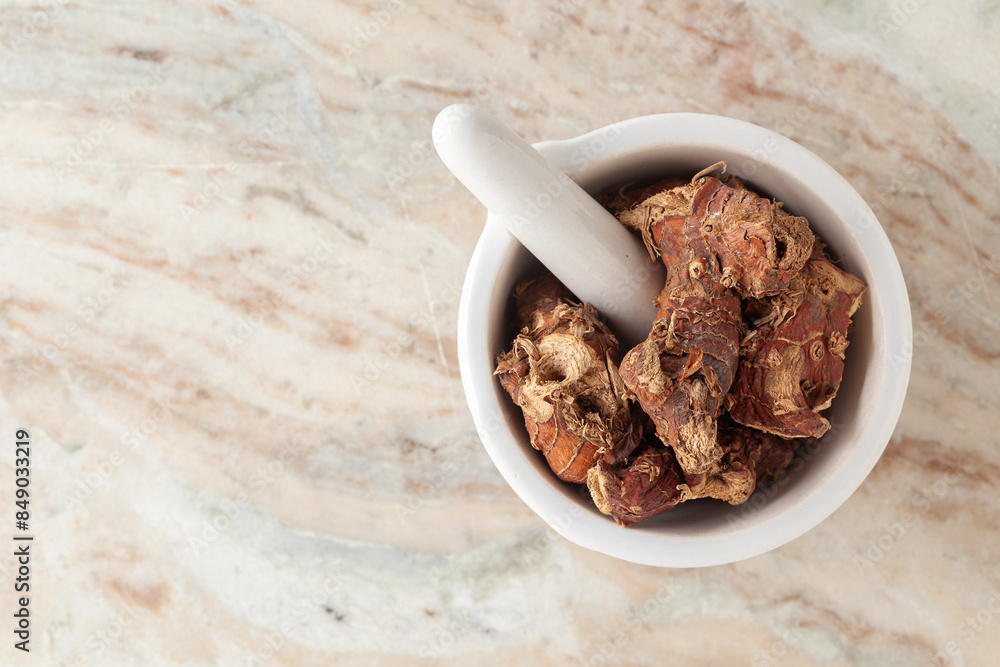 Top-view of Dry Organic Kulanjan (Alpinia galanga) roots, in white ...