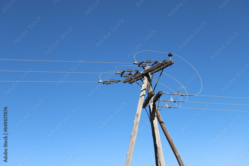 Electricity. Electrical poles. Light posts. High tension cables on ...