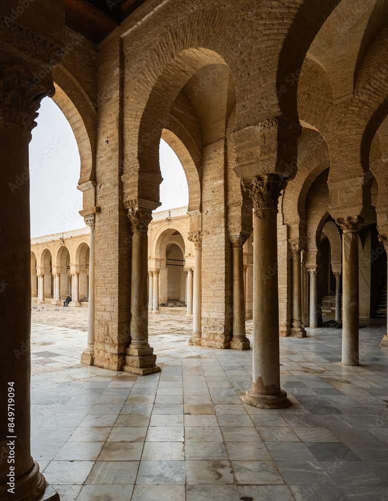 Corridor gallery around inner courtyard of Great Mosque of Kairouan in ...