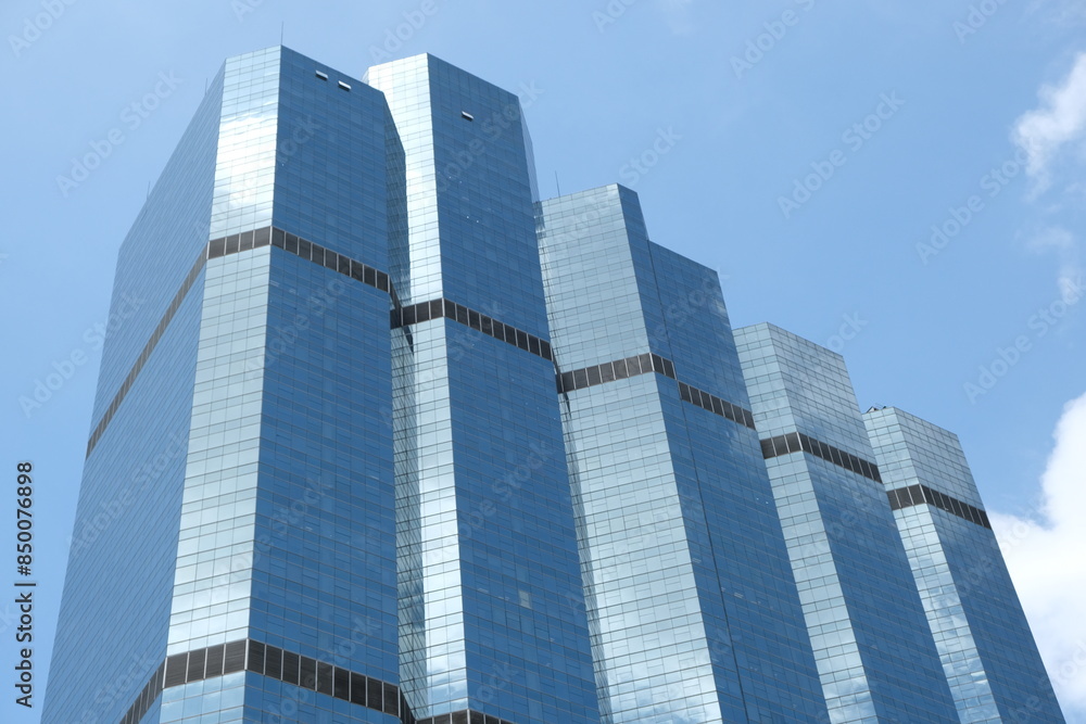 Modern office building complex The Empire soars into blue sky in Thai ...