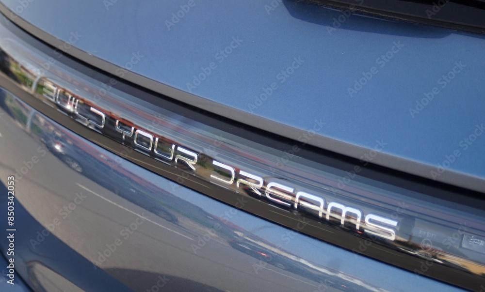 Build your Dreams ; Slogan on a modern BYD electric car Stock Photo ...