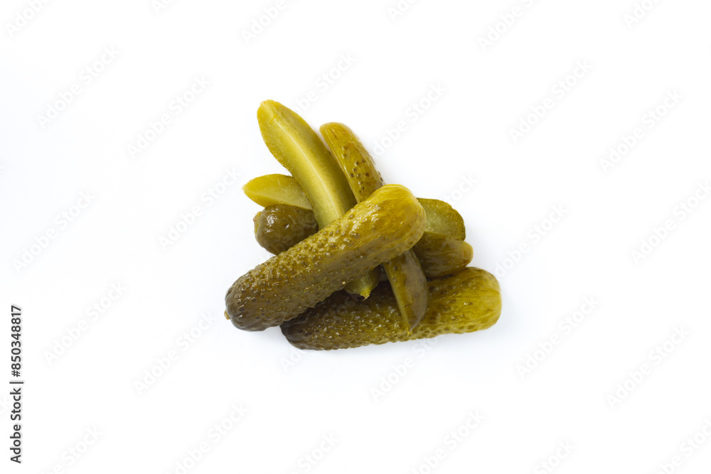 pile of cucumber dill pickle, spears, chips and whole isolated on white ...