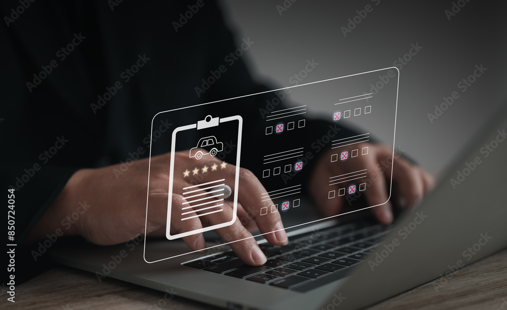 Person using a laptop with transparent virtual interface digital car ...