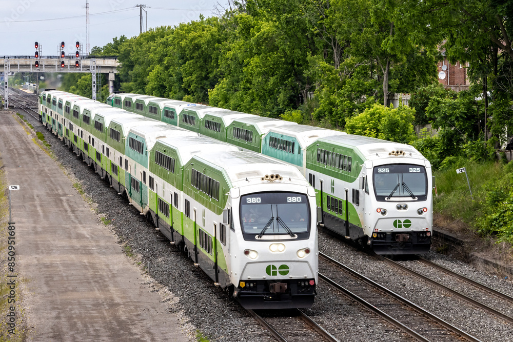 Toronto Canada, June 10 2024; The caboose ends of two GO Transit commuter trains passing each ...