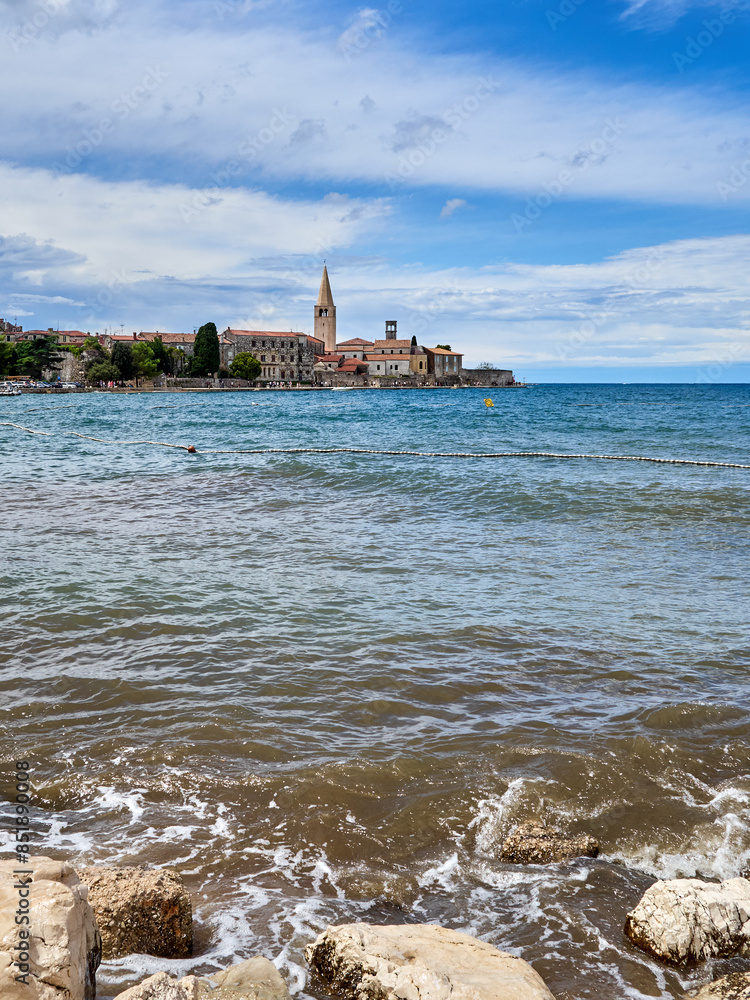 Panoramic view of Porec Old Town, with the tower of the Euphrasian ...