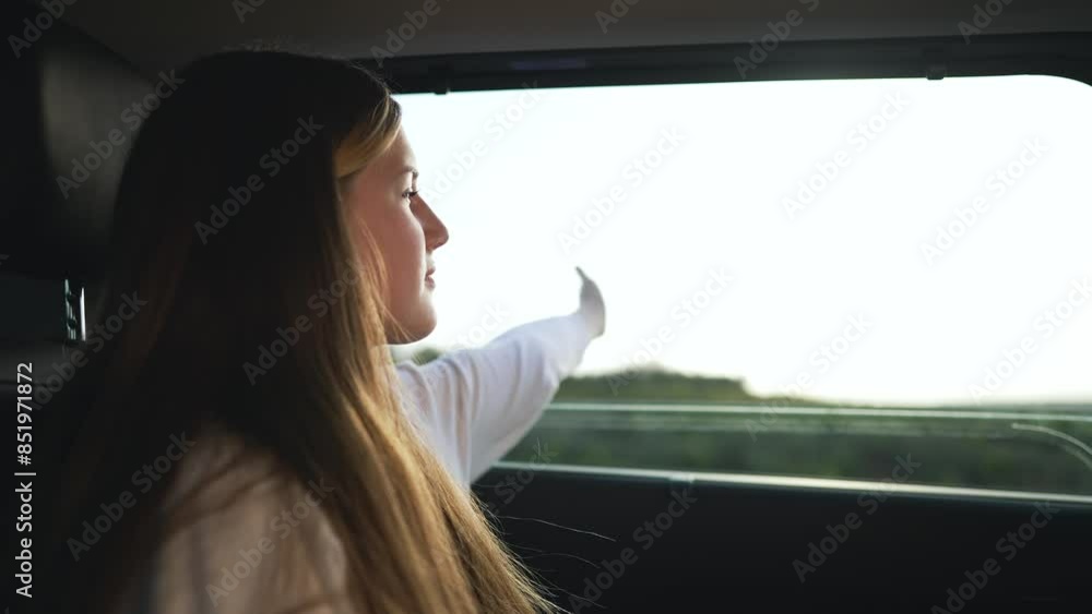 Adventure road trip. girl reaching hand out car window. girl embracing ...