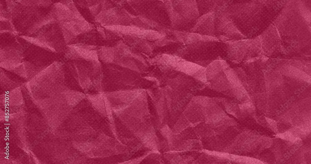 Wideo Stock: magenta crumpled wrinkled sheet of paper. Stop motion ...