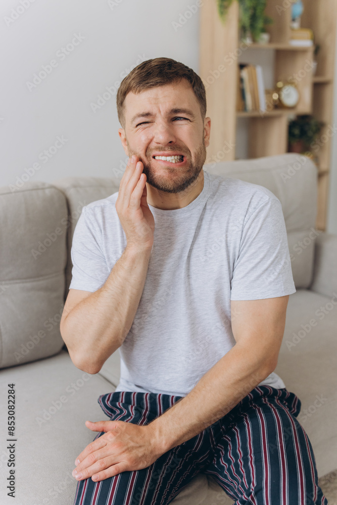 Dental health problems concept. Man suffering from strong toothache ...
