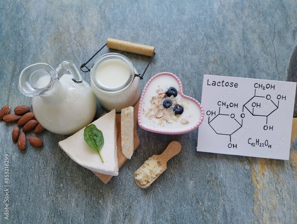 Fotografia Foods high in lactose with structural chemical formula of ...