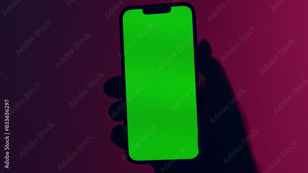 Green phone screen on a colored background. Green screen. Green background. For overlays Stock ...