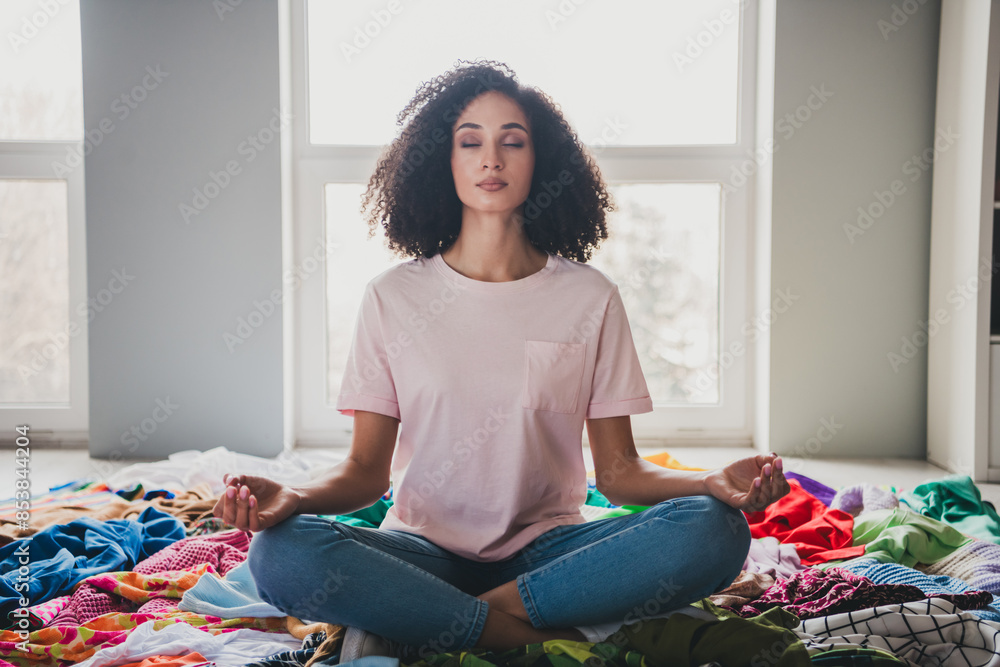 Full size photo of nice young woman sit messy pile stack clothes ...