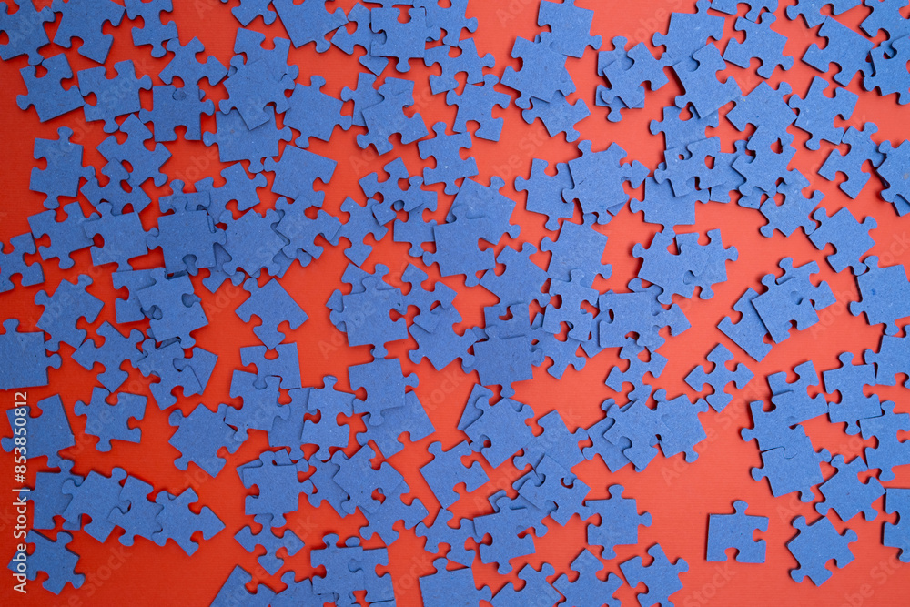Top view of many puzzle pieces throughout the frame. Background image ...