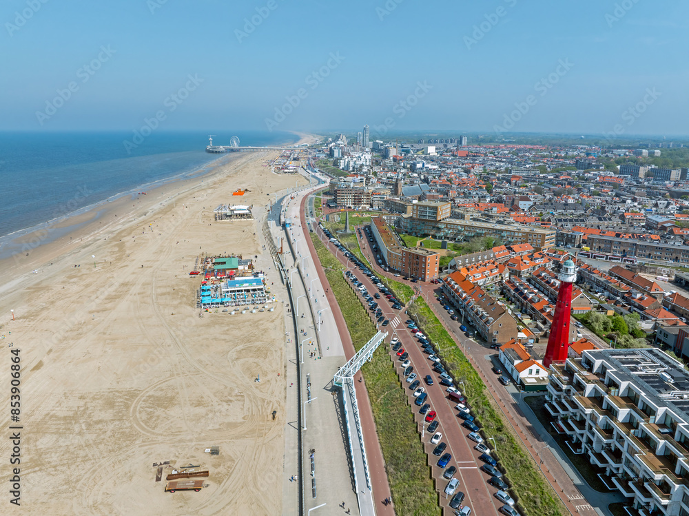 Aerial from Scheveningen with the lighthouse at the North Sea in the ...