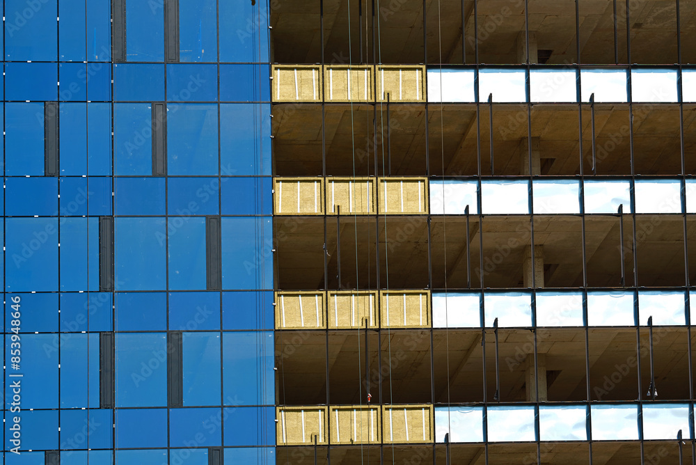Glazing and insulation facade of new building, building construction ...