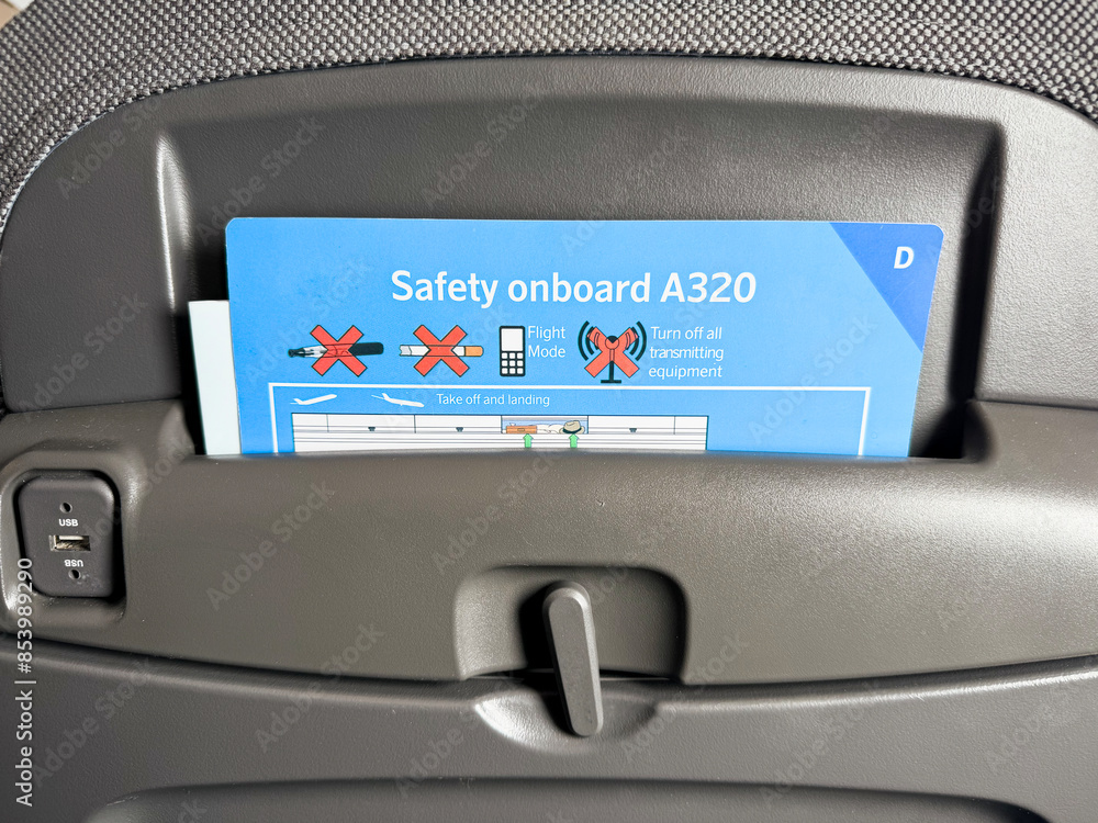 Poster safety card for A320 Airbus airplane inside front seat with ...