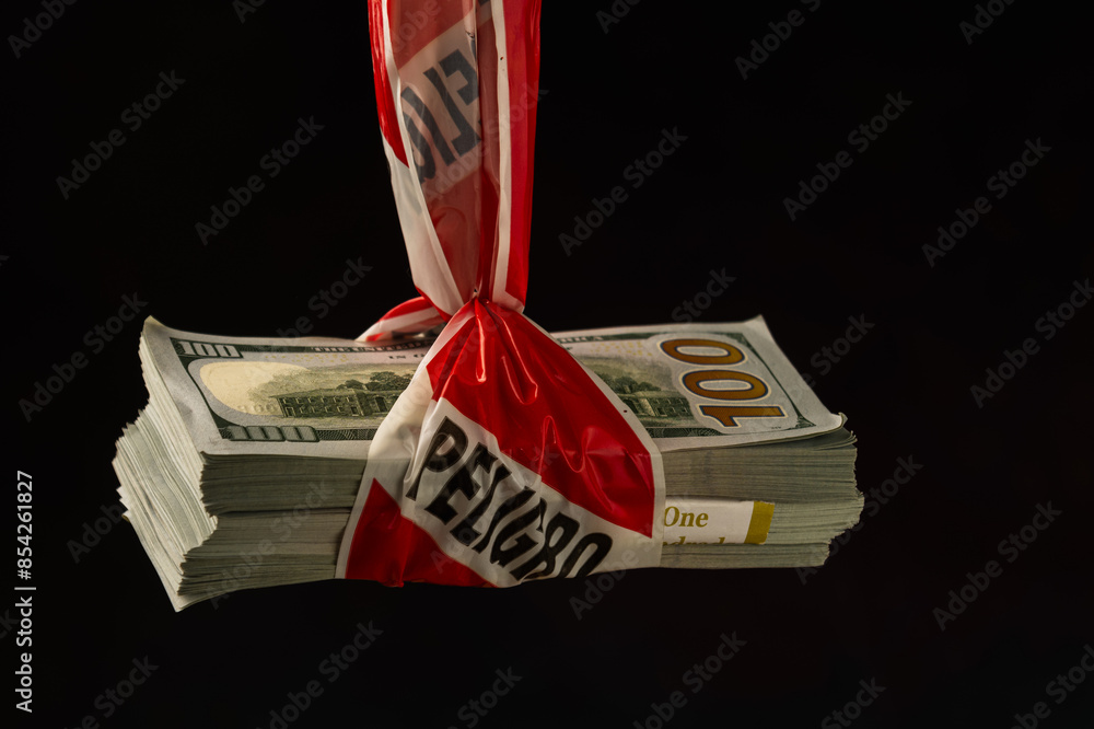 Bundles of 100 dollar bills and Argentine pesos, Argentine currency ...