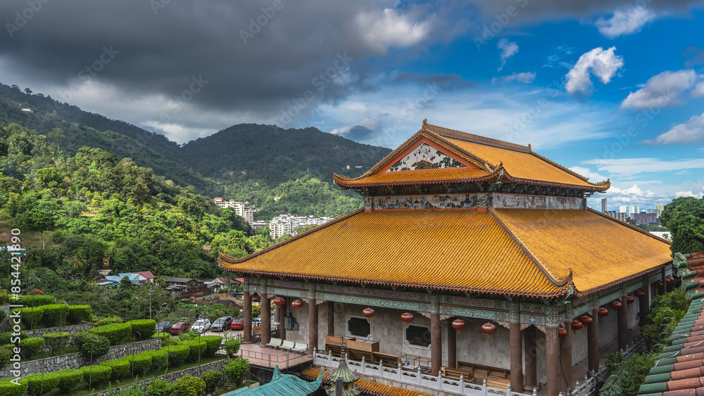 Details of the architecture of the Chinese temple. The tiled roof of ...