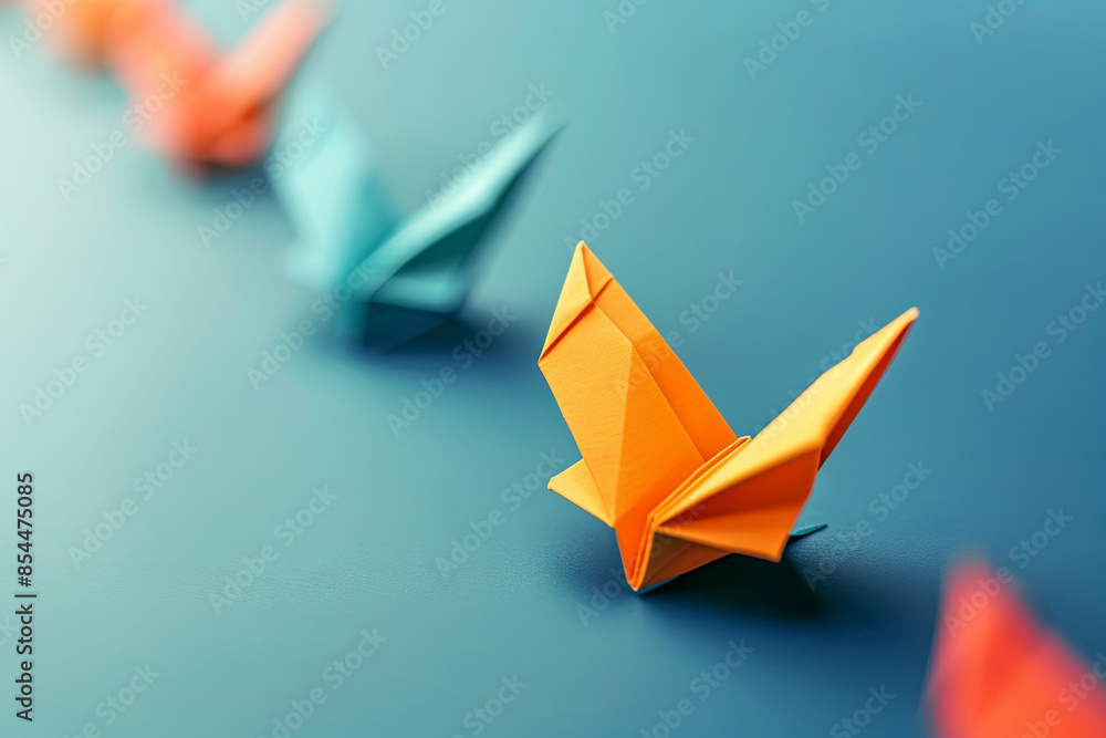 Paper origami symbolizing success, transformation, and leadership ...