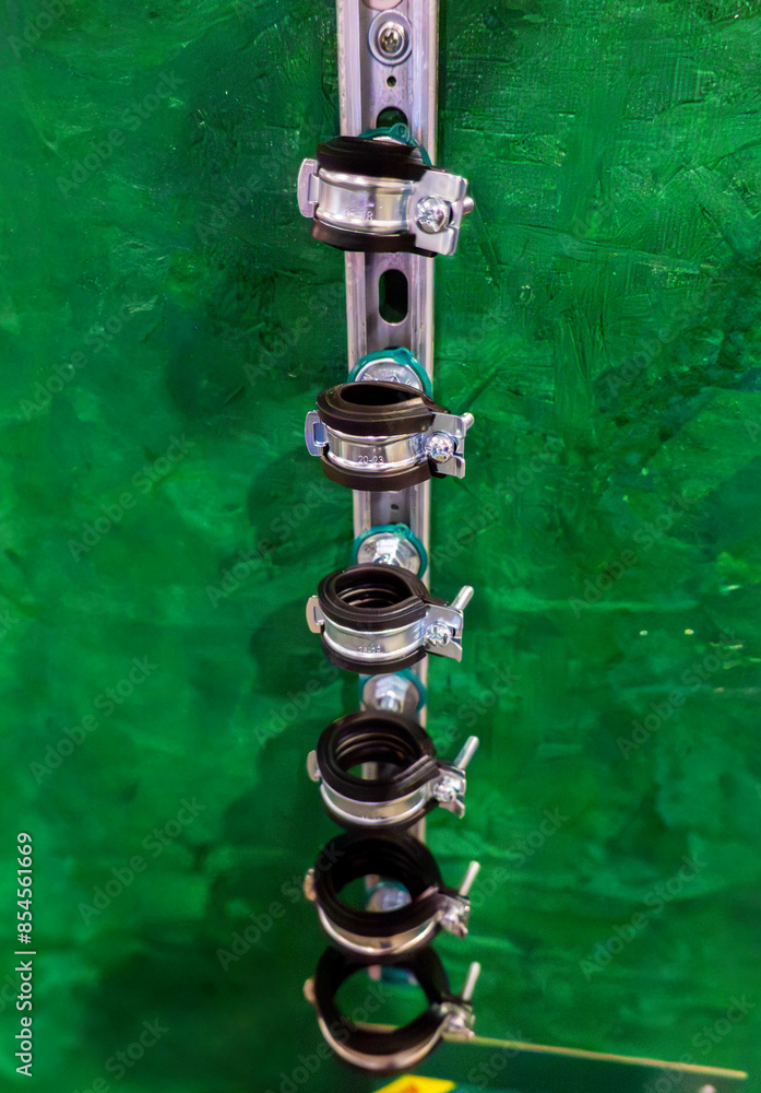 Fastening system. Double-screw pipe clamp with a locking ring. Stock ...