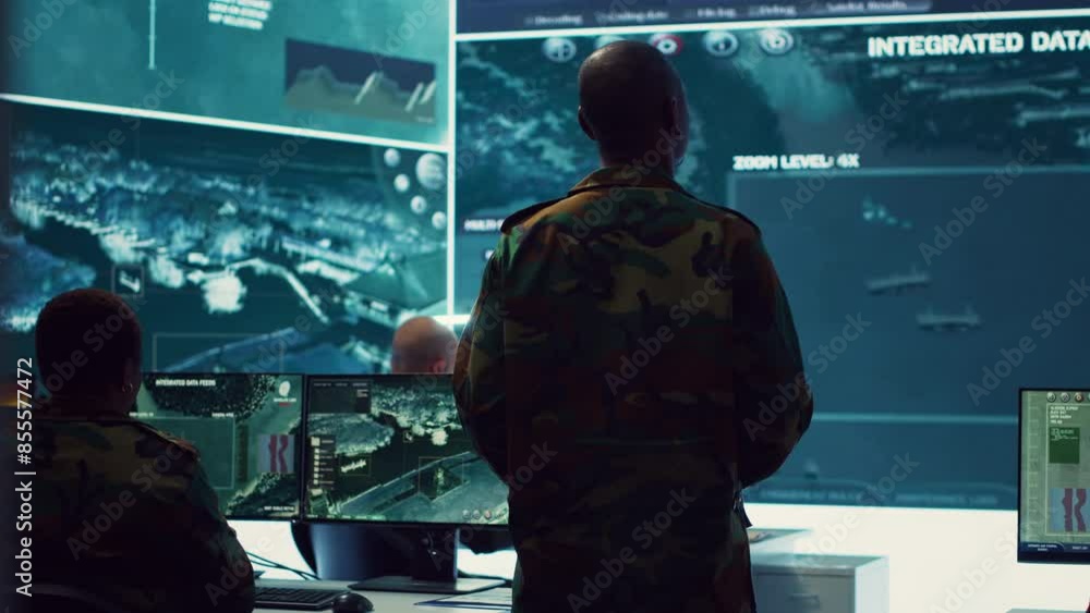 Commander and his crew operating radar systems via CCTV and satellite ...