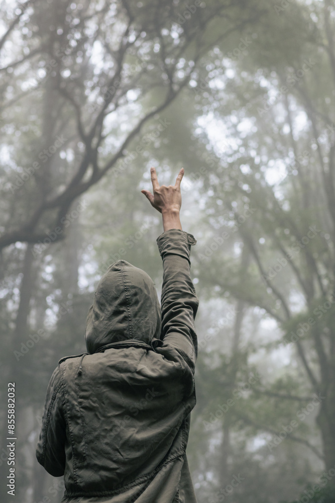 man uses sign language I love you to express his love and friendship ...