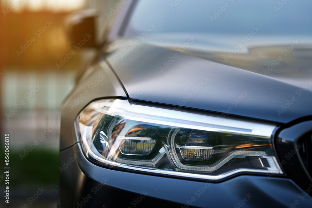 Minsk, Belarus. May 3, 2024. Headlight of modern black sports car BMW ...