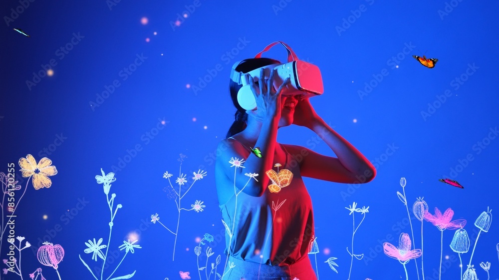 Beautiful Asian woman with VR to metaverse interacting virtual neon ...