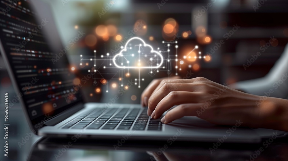 Hands Typing on a Laptop, with a Prominent Cloud Computing Icon Displayed Above the Device ...