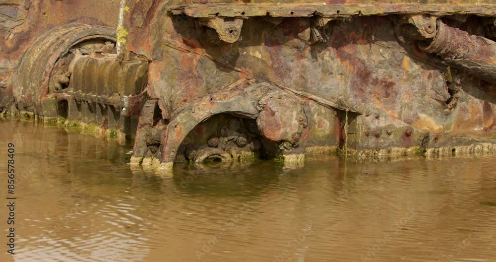 Mid shot of the tank on the beach. showing the right back side wheel of ...