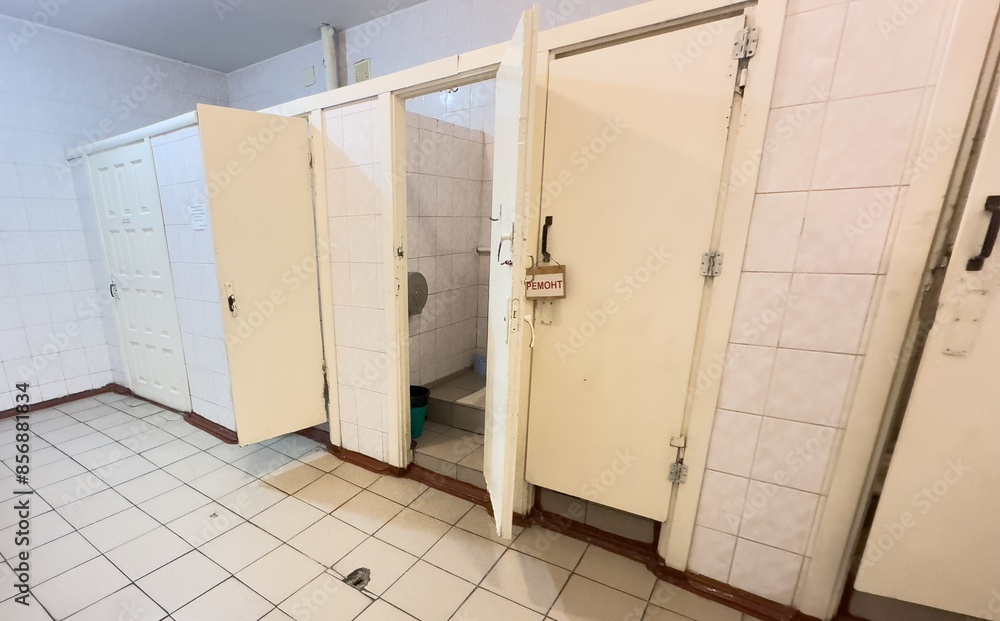 Public men's restroom. Urinal in men's restroom. Interior of bathroom ...