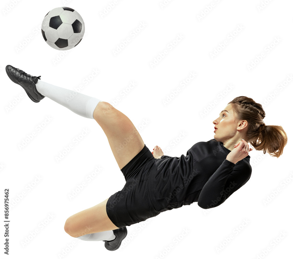 Dynamic image of competitive soccer player, young girl in black uniform ...