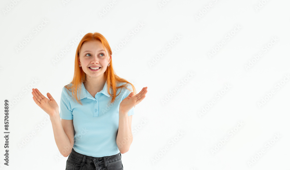 Silly mistake. Close up of cute girl saying sorry, shrugging shoulders ...