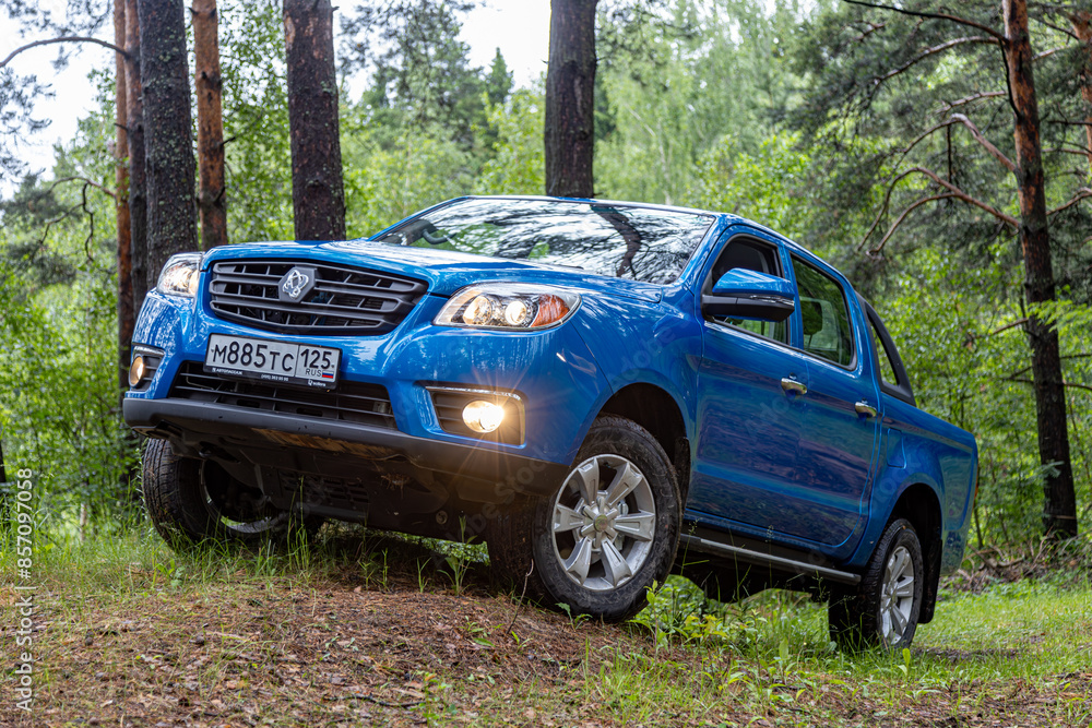 Moscow, Russia - June 2024: Blue pickup truck in the forest. sollers st6 - Jac t6 Stock Photo ...