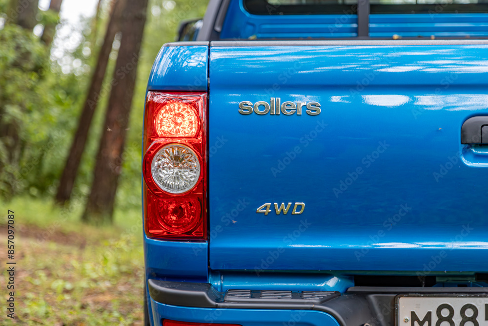 Moscow, Russia - June 2024: Blue pickup truck in the forest. sollers ...