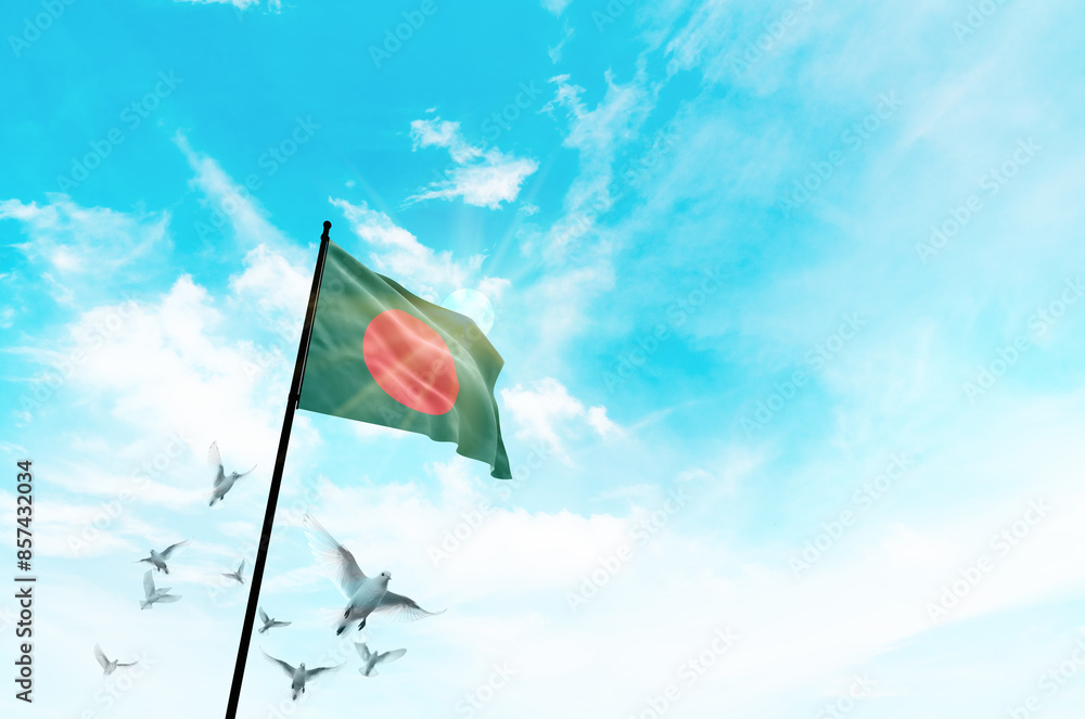 Bangladesh flag waving with flying doves against sunset or sunrise ...