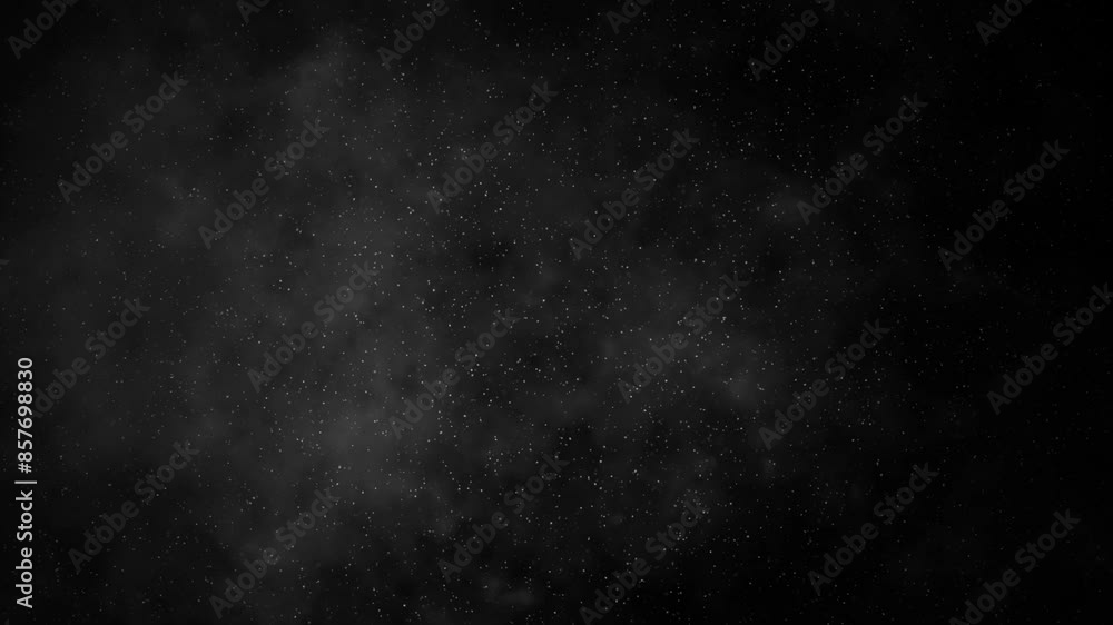 Visual effects, VFX, wispy smoke and dust particles on black background ...