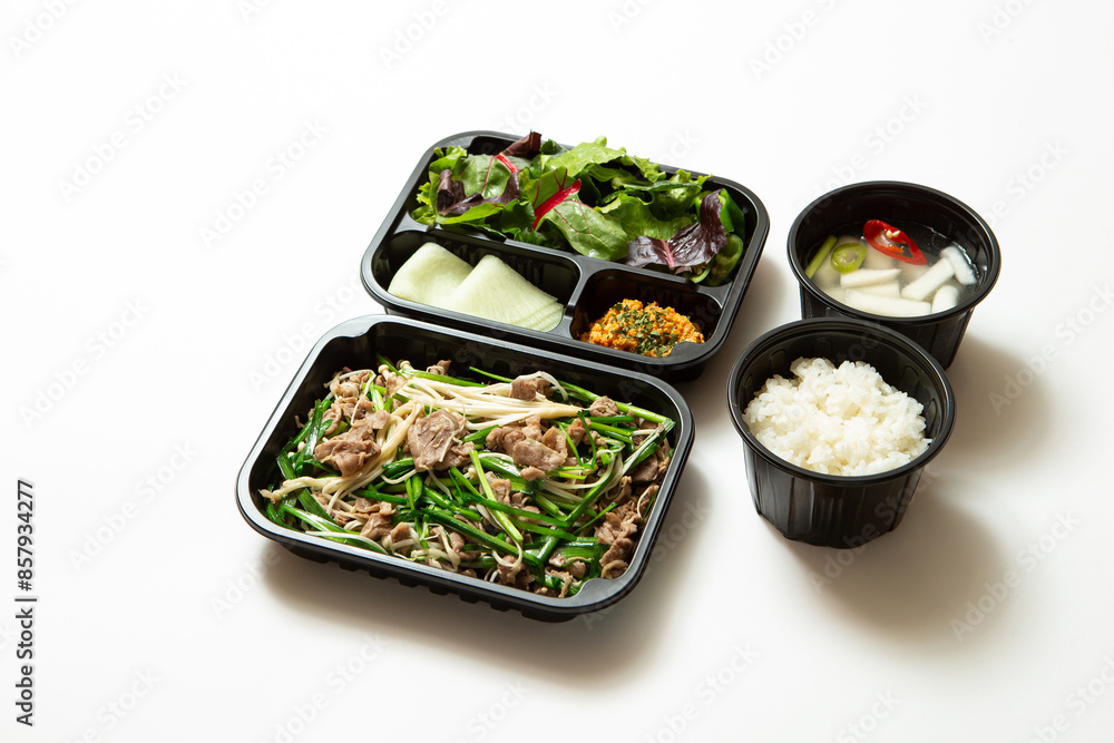 Stir-fried meat and side dishes in packaging containers, Korean food ...