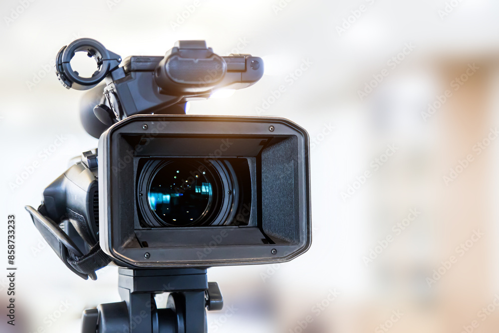 Video camera with blur background for journalist interview broadcasting ...