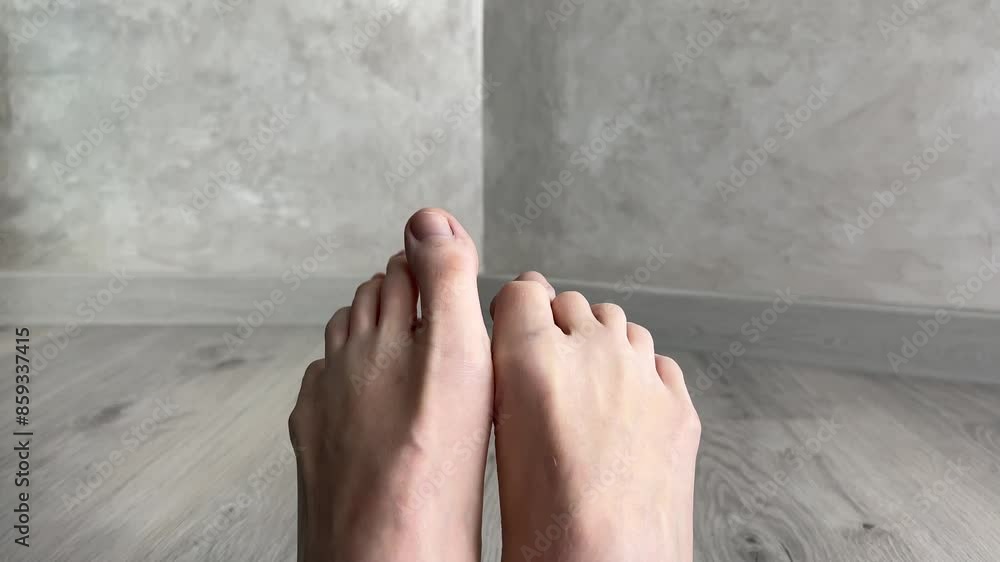 Bare feet showcase flexibility and anatomy, moving toes in various ...