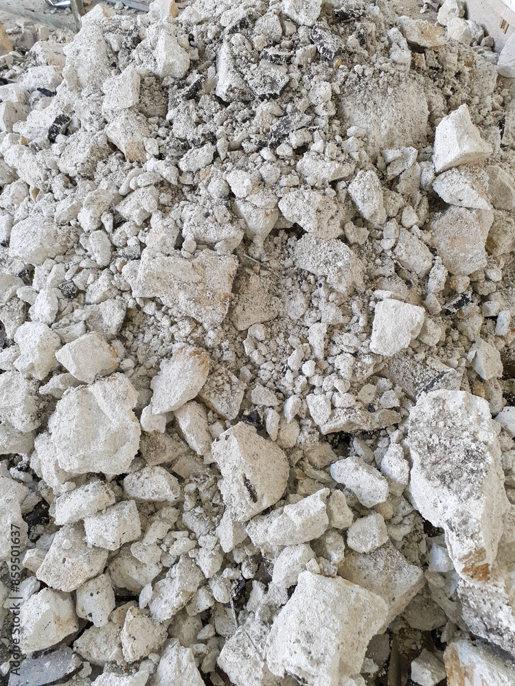 Rubble from RAAC concrete demolition at construction site. Reinforced ...