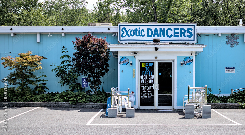 Exotic Dancers sign on entrance to Blue Moon Cabaret strip club on main ...