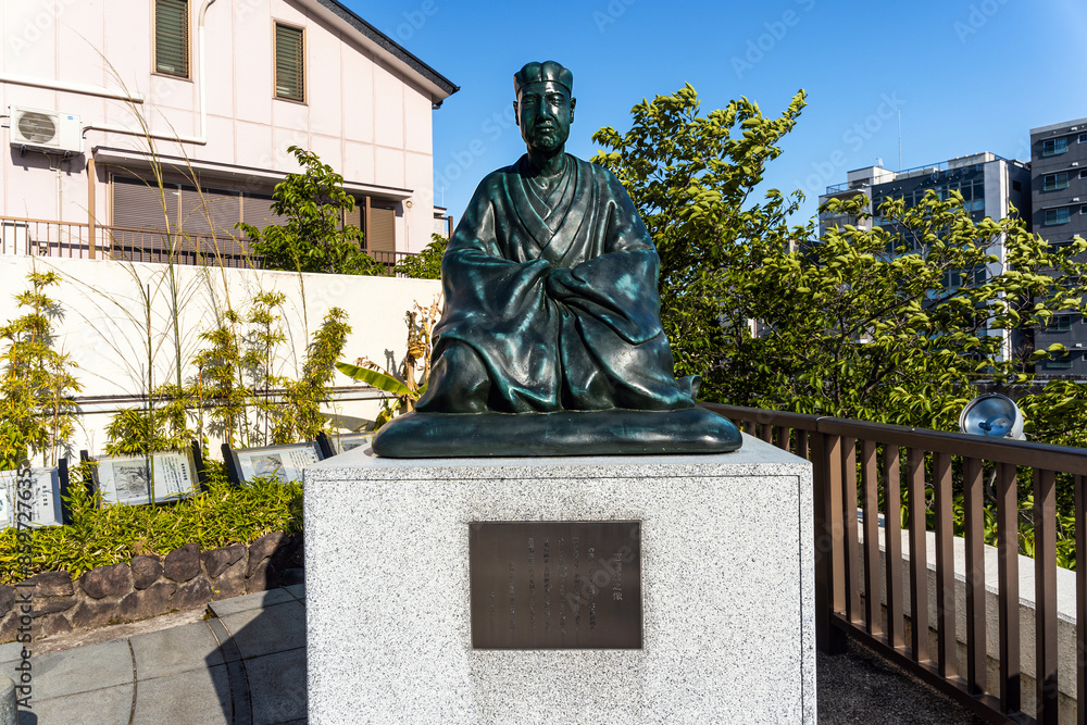 Statue of Japanese poet Matsuo Basho in the Basho Heritage Garden, in ...