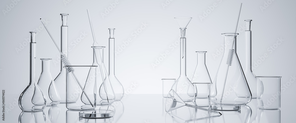 Group of scientific laboratory glassware with clear liquid solution ...