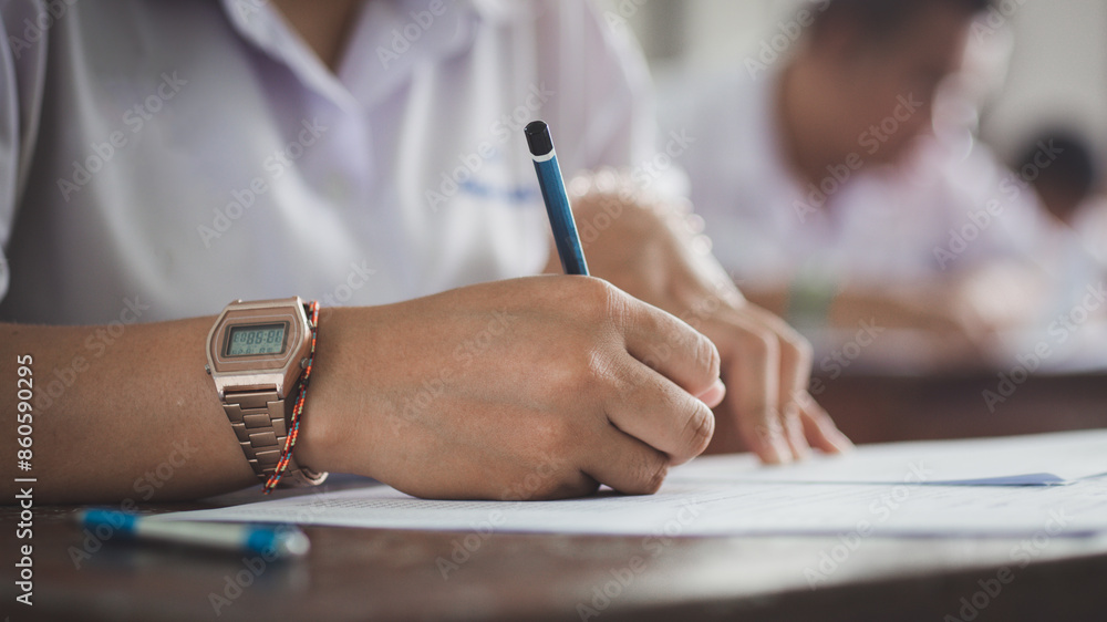 Assessment examination of high school students dressed in uniform.The ...