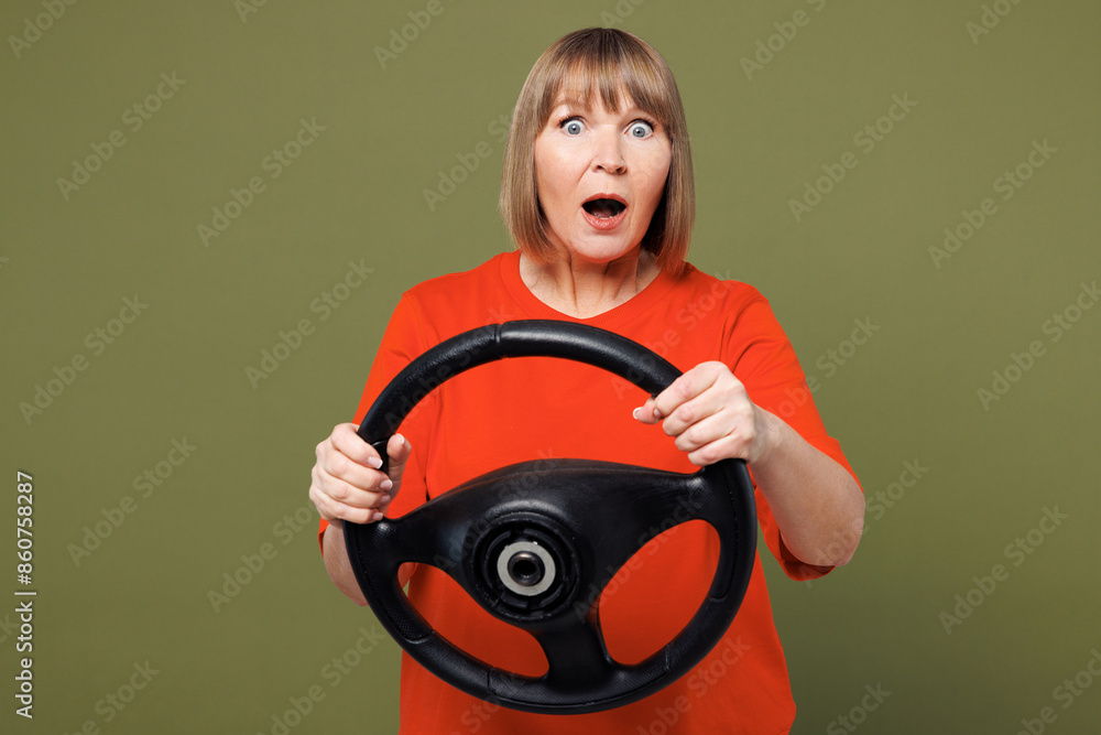 Elderly shocked sad scared blonde woman 50s years old wear orange t ...