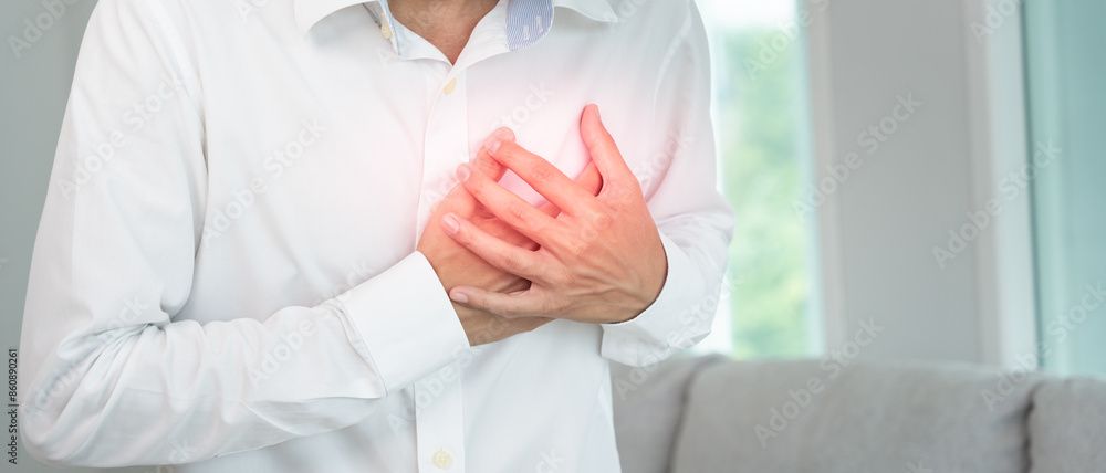 hand hold chest with heart attack symptoms, asian man working hard have ...