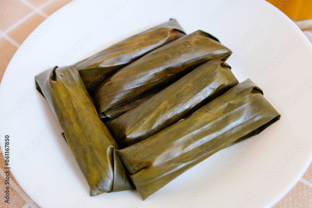 Lemet singkong or utri or ketimus is a traditional snack from Indonesia ...