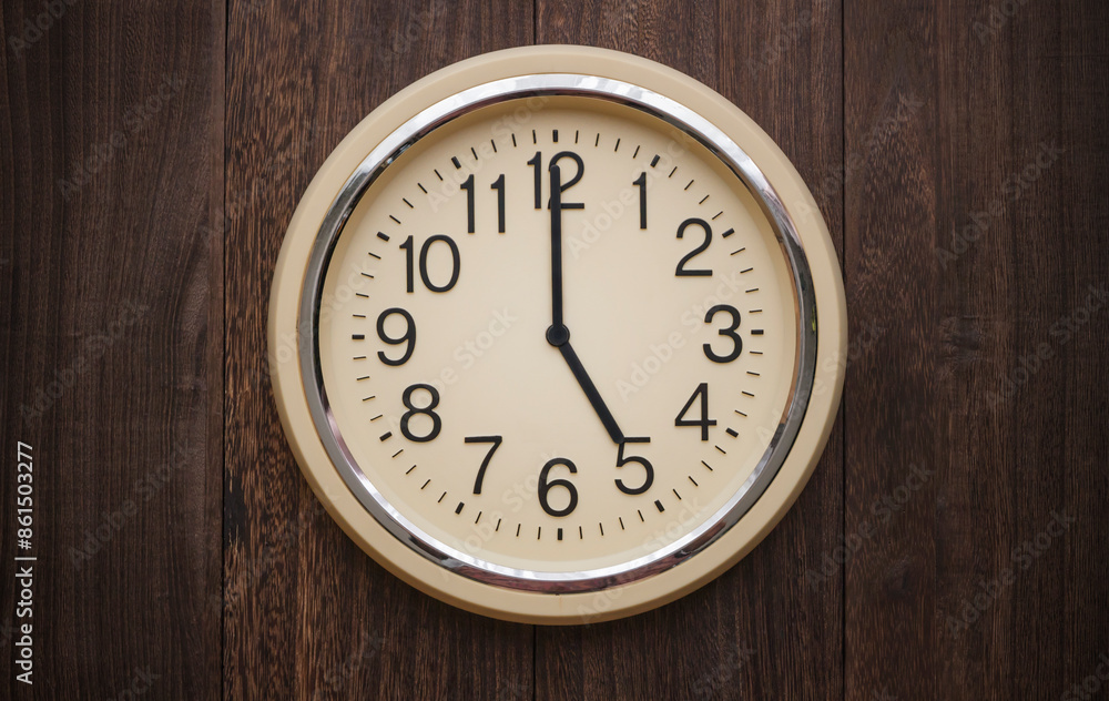 Wall clock showing 5 o'clock sharp. five o'clock Stock Photo | Adobe Stock