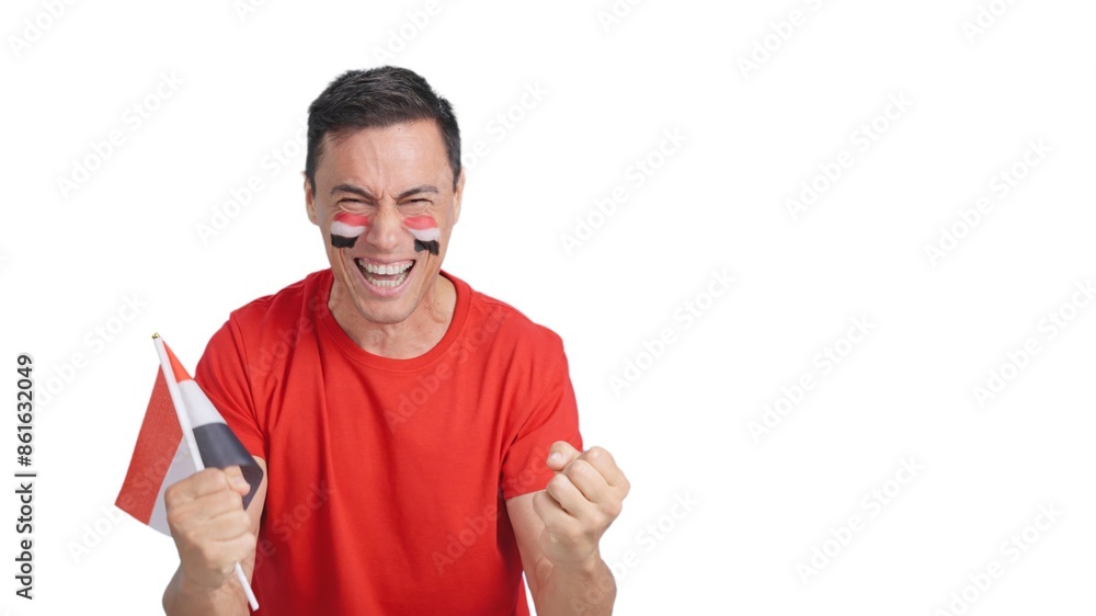 Man cheering for Egypt screaming and waving a national flag Stock Photo ...