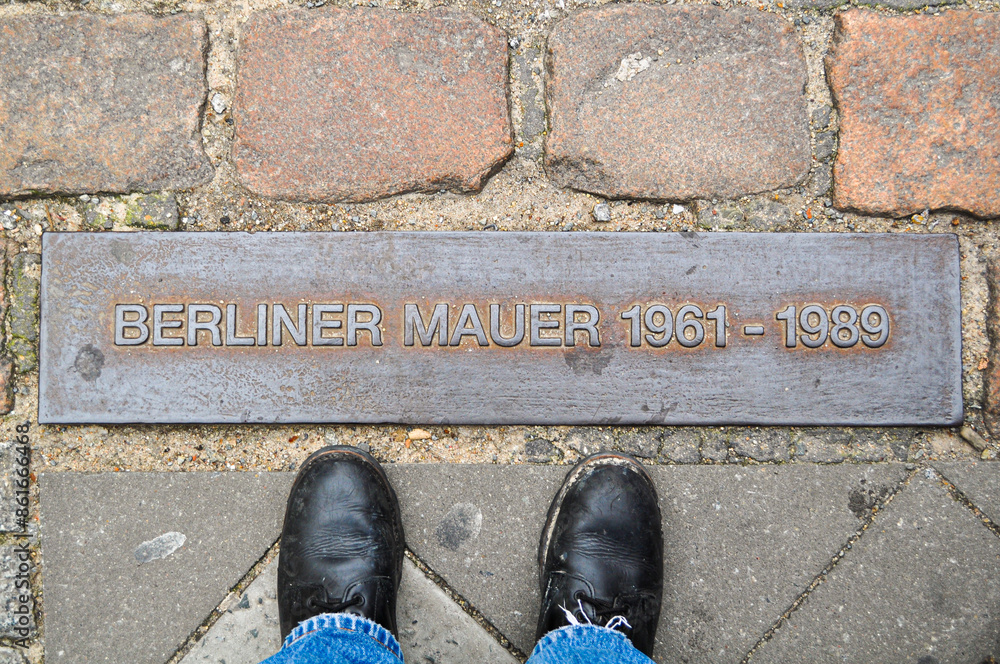 Berlin, Germany. Plaque of the former location of the Berliner Mauer ...